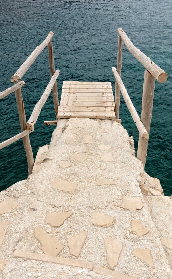 Wooden Dock at the Cliff Over Water Stock Photo - Image of bannister ...