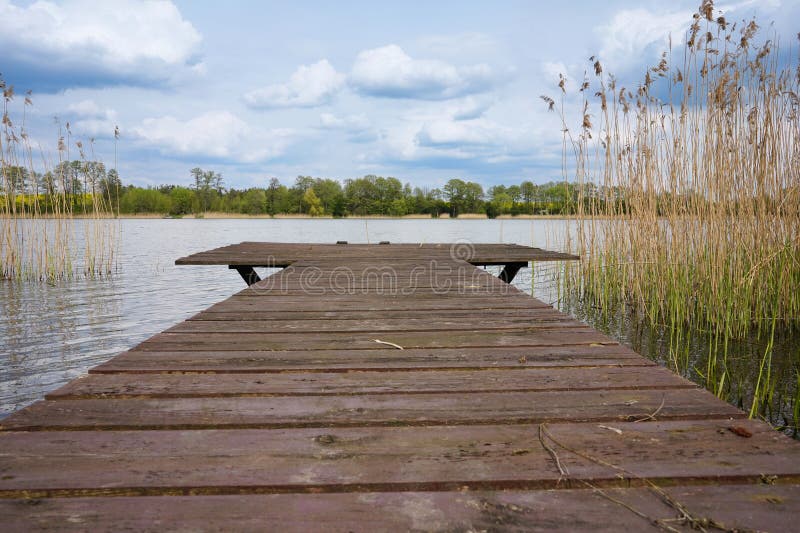 Wooden Dock at the Lake. Jetty at the Lake. Beautiful Sunset at the ...