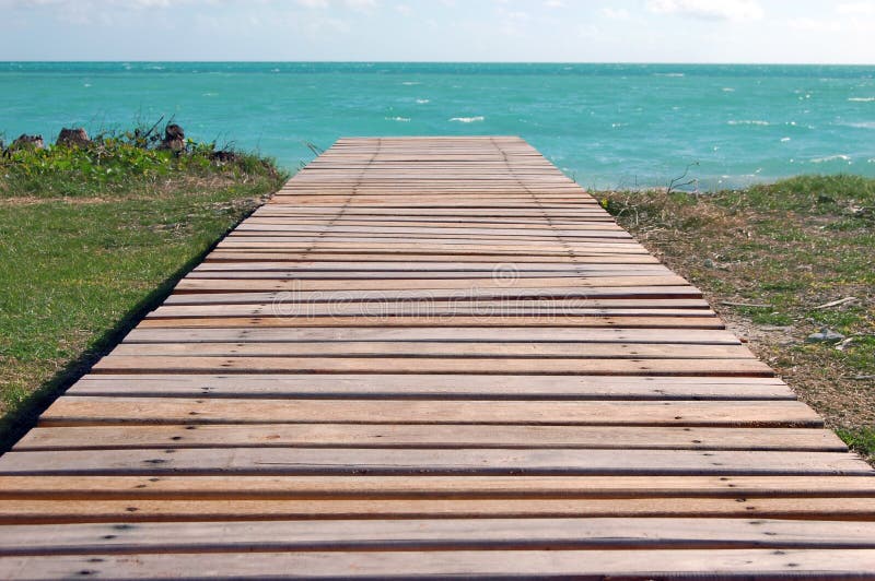 Wooden Dock on the Ocean stock photo. Image of waterfront - 66471468