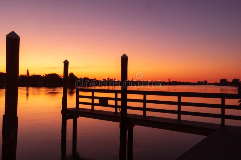 Wooden Docks on the Sea Gleaming Under the Beautiful Sunset Stock Photo ...