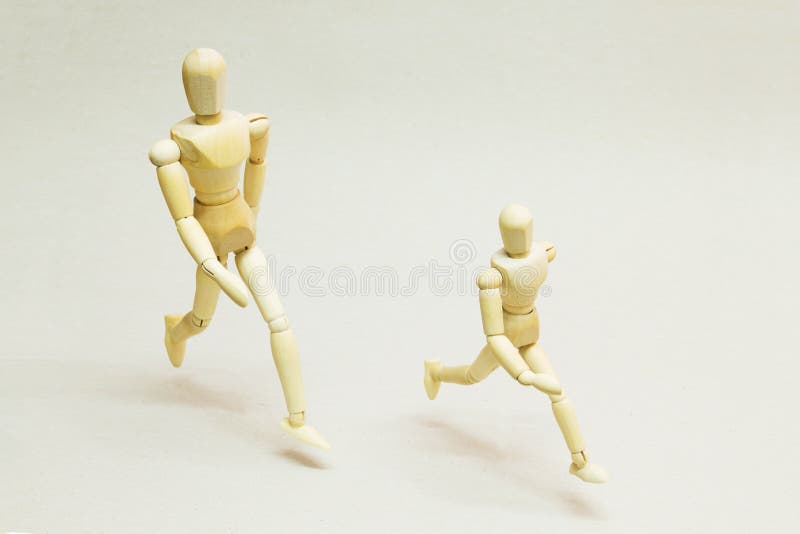 Wooden Doll in Action stock photo. Image of male, exercise - 84618434