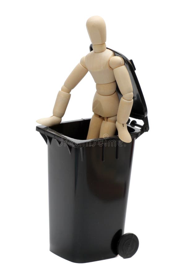 Wooden doll in garbage bin stock photo. Image of still - 26876848