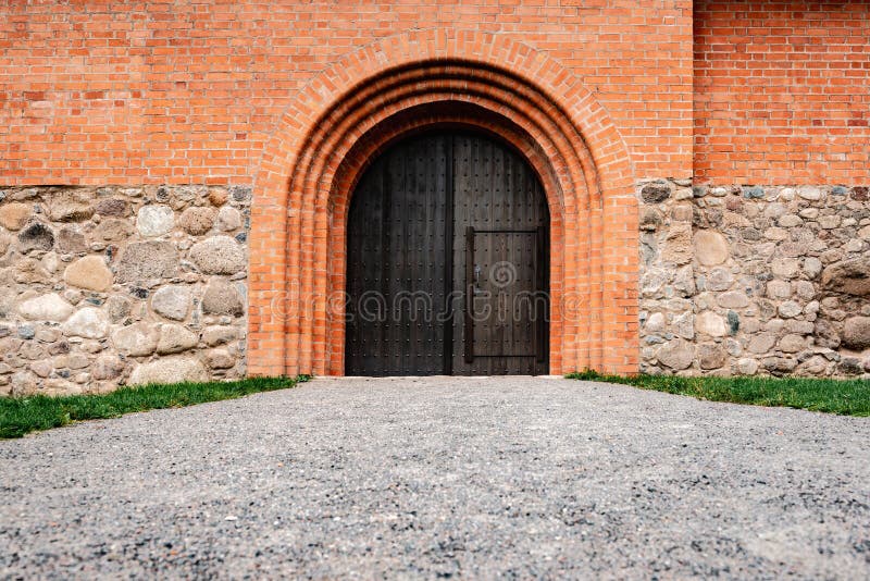 Wooden Door in the Castle of Red Bricks. Stock Photo - Image of closed ...