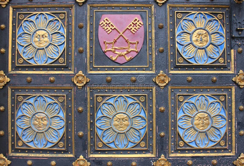 Wooden door with emblems stock photo. Image of entrance - 39343148