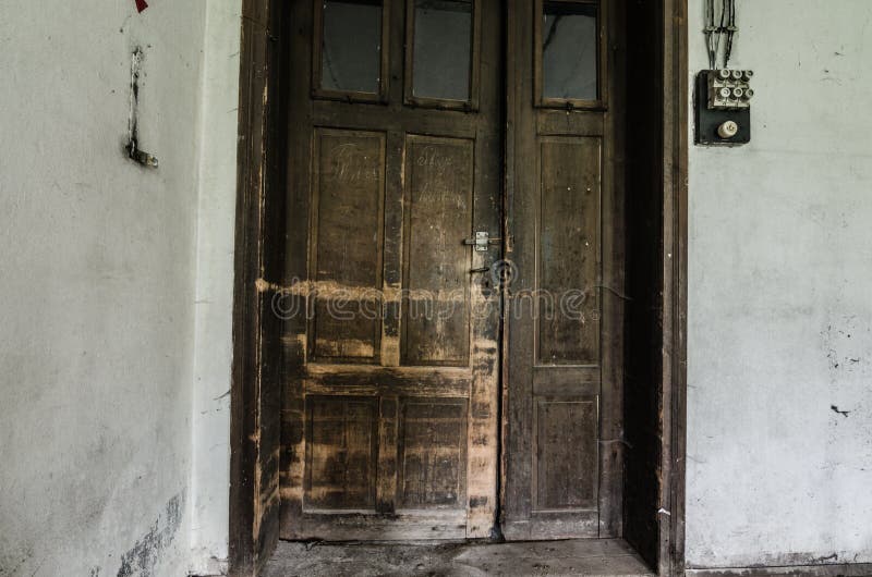 Wooden door in factory stock image. Image of facility - 86120865