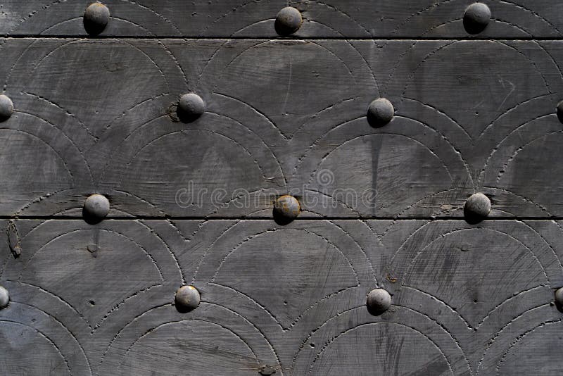 Wooden Door with Metal Round Buttons Stock Image - Image of horizontal ...