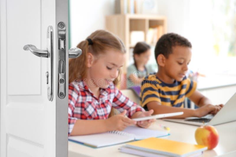 Wooden Door Open into Classroom with Students Stock Image - Image of ...