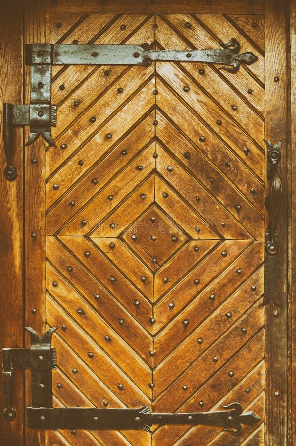 Wooden Door in Retro Style with Forged Elements Stock Image - Image of ...