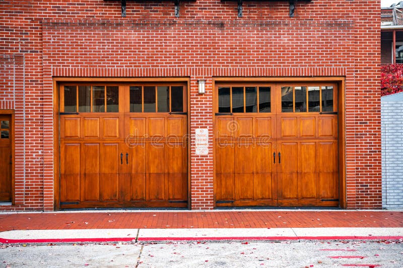 Wooden Doors of a Large Brick Building Stock Image - Image of building ...