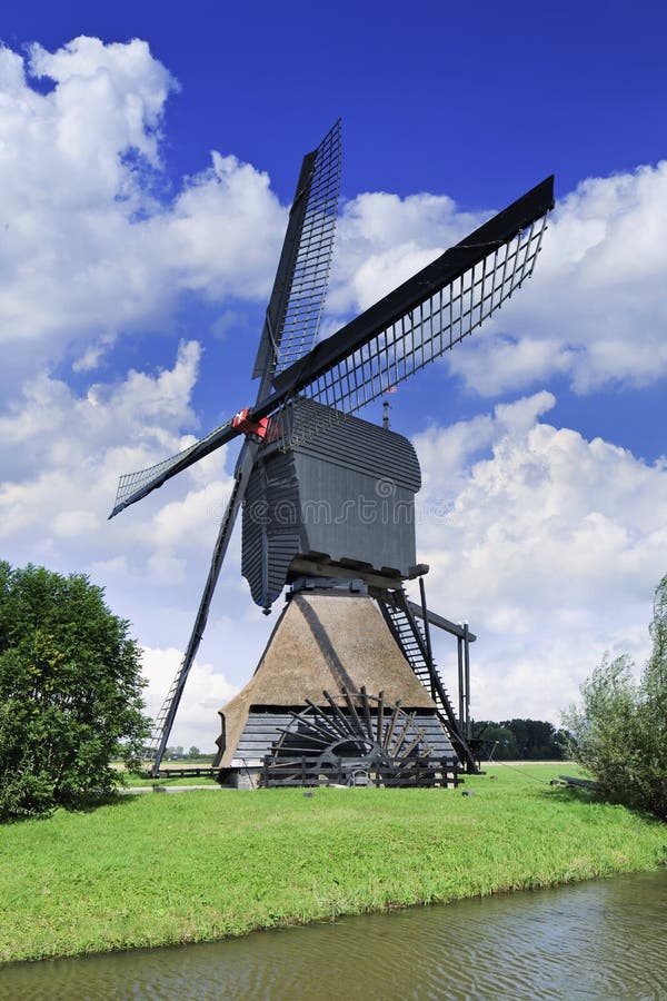 Wooden Drainage Windmill in a Polder with a Blue Sky and Dramatic ...