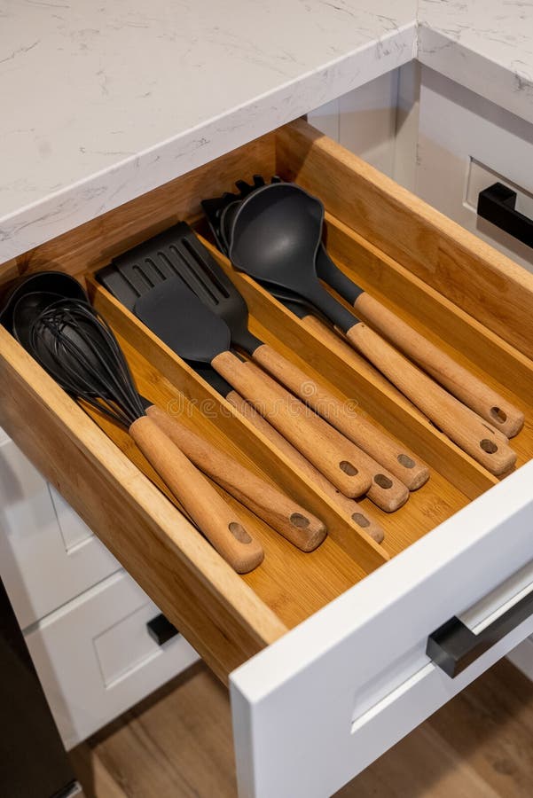 Wooden Drawer Containing Various Types of Kitchen Utensils Stock Photo ...