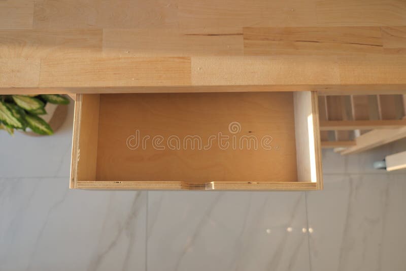 A Wooden Drawer Interior that Features a Sophisticated Minimalistic ...