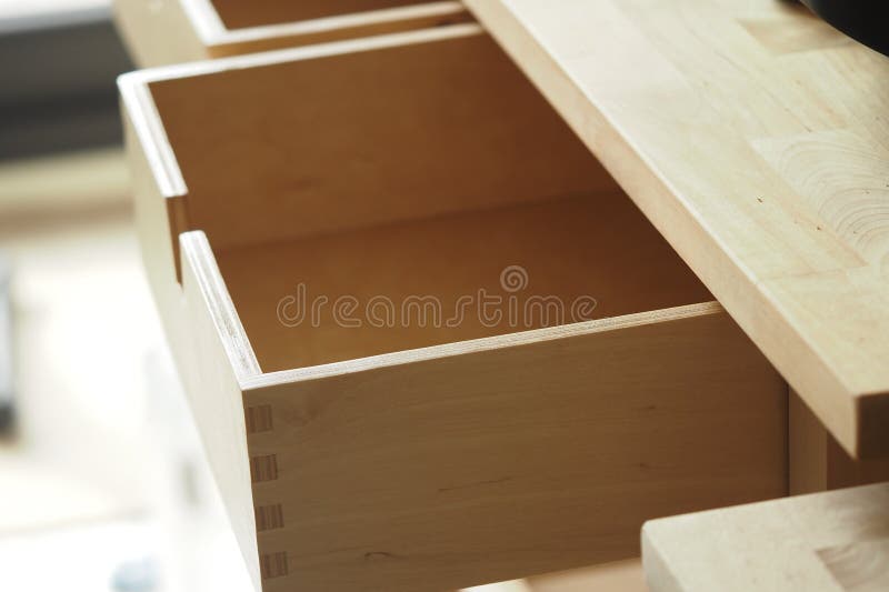 Wooden Drawer Partially Open in a Modern Workspace Stock Image - Image ...