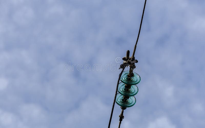 A Wooden Electricity Pole with Green Insulators Stock Image - Image of ...