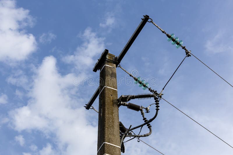 A Wooden Electricity Pole with Green Insulators Stock Photo - Image of ...
