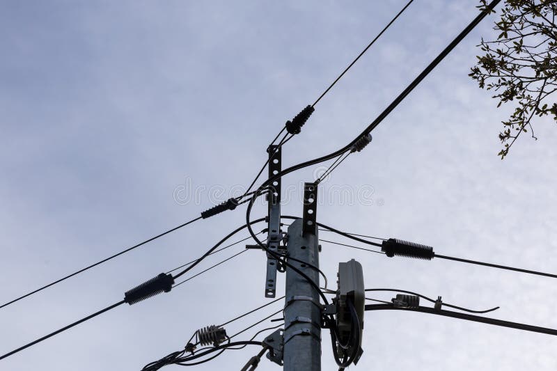 A Wooden Electricity Pole with Green Insulators Stock Image - Image of ...