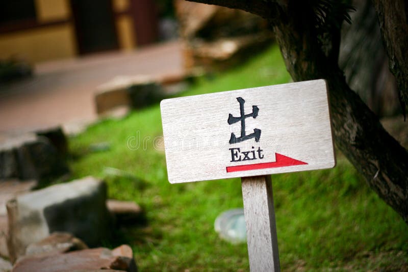 Wooden EXIT sign stock photo. Image of arrow, green, signpost - 12321736