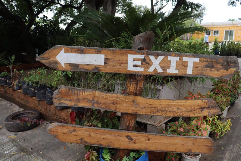 Wooden Exit Sign Board Showing Direction Stock Photo - Image of green ...