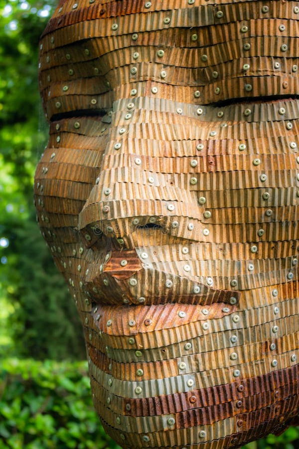 Wooden Face Sculpture with Riveted Eyes Editorial Stock Image - Image ...