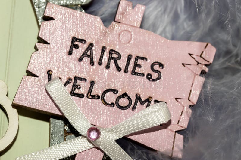 Wooden Fairies Welcome Sign in Pink Stock Image - Image of label ...