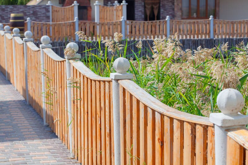Wooden Fence with Decorative Figures Stock Image - Image of paling ...