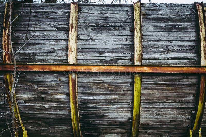 Wooden Fence with Metal Rusted Strips Stock Photo - Image of antique ...
