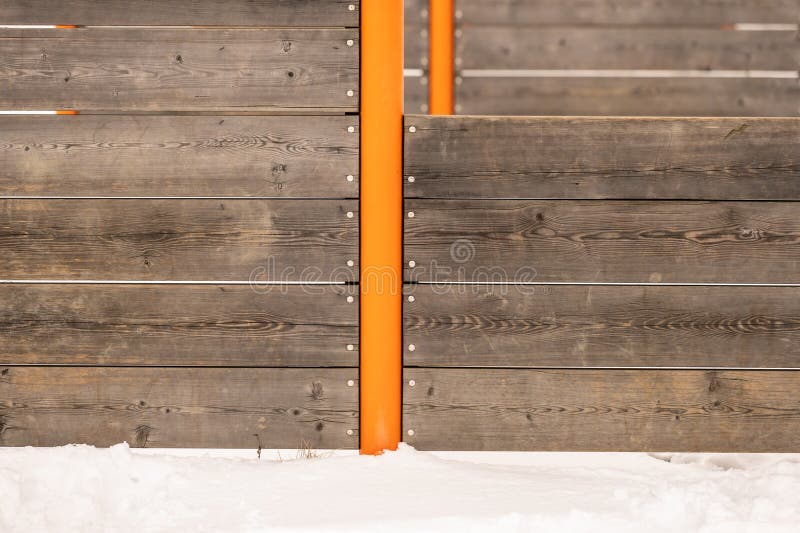 Wooden Fence with Orange Metal Post.. Stock Image - Image of ...