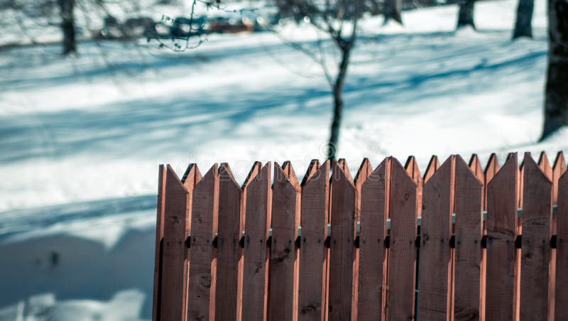 Wooden fence in snow stock photo. Image of landscape - 142947290