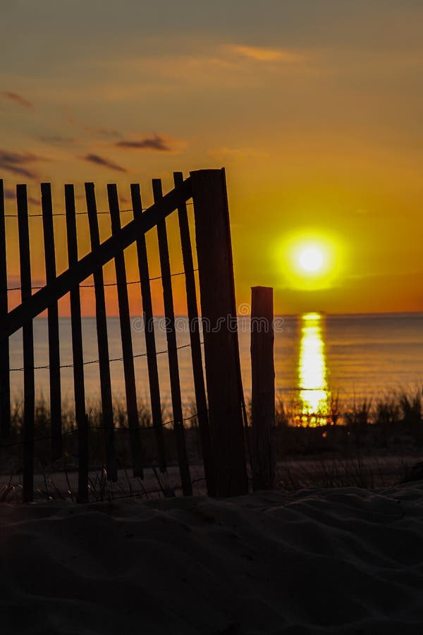 Wooden Fence with Gras and Sunset Sky in Cape Cod Stock Image - Image ...