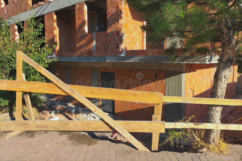 Wooden Fences at Sidewalk Next To the House Under Construction To ...