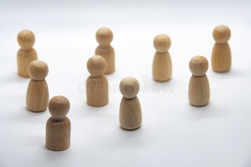 Wooden Figure Gather As a Group on White Background. Teamwork Concept ...