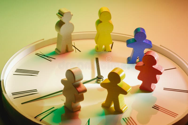 Wooden Figures on Clock stock image. Image of life, parents - 21416201