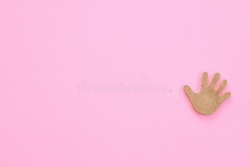 Wooden Figures in the Form Hand on a Pink Background Stock Photo ...