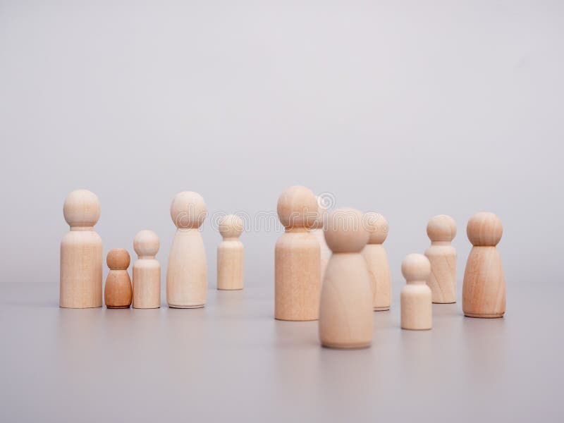 Wooden Figures. a Group of People Standing Together at a Table Stock ...