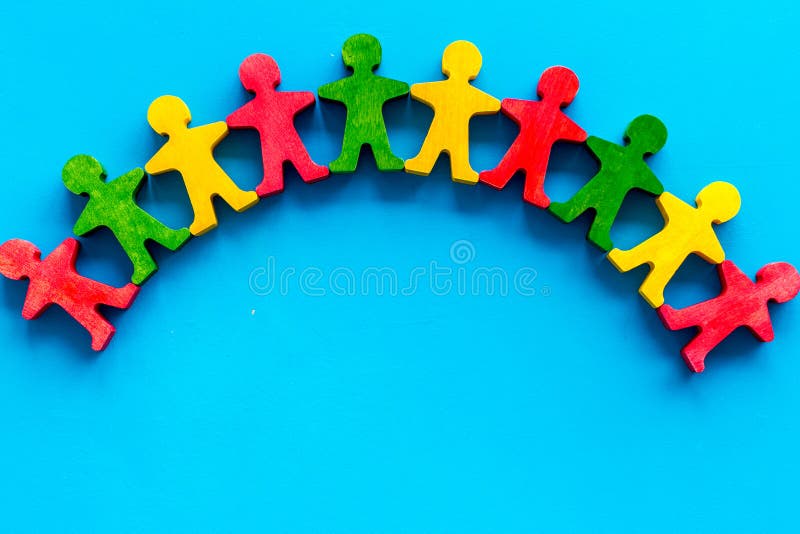 Wooden Figures of People on Blue Background Top View. Teamwork ...
