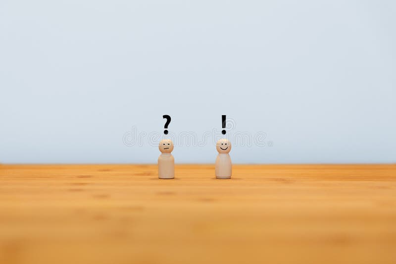 Wooden Figures of 1 Person with Question Mark and Other with an ...