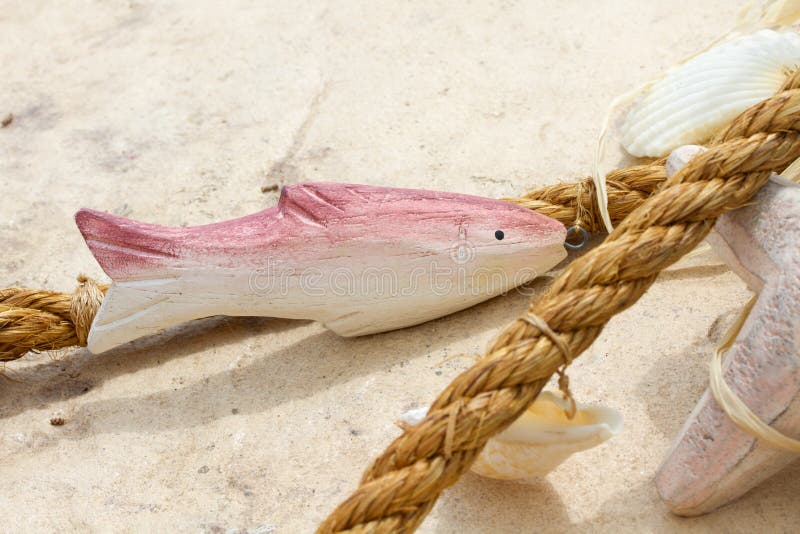 Wooden fish and rope stock image. Image of toys, holiday - 47038465