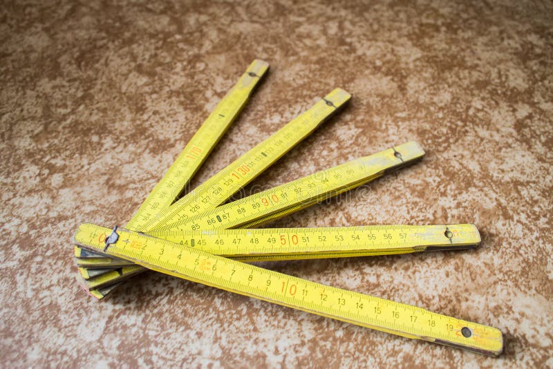 Wooden Folding Ruler stock photo. Image of measurements - 99951172