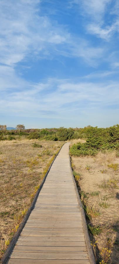 Beach with Clouds and Sunshine. Stock Photo - Image of coastline, cloud ...