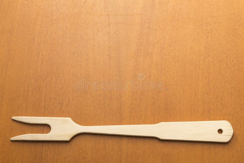 Wooden fork on the table stock image. Image of traditional - 108121581