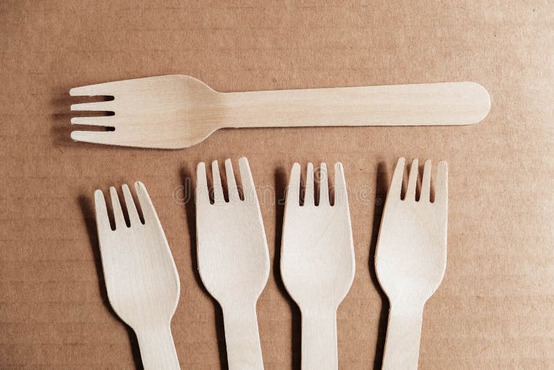 Wooden Forks on a Cardboard Background. Eco Friendly Disposable ...