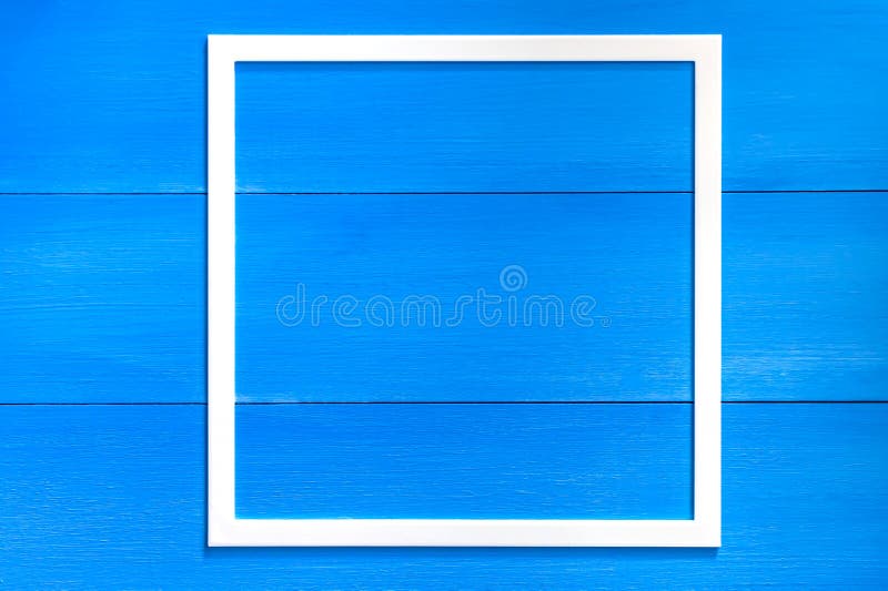 Wooden Frame on a Blue Background. Blank Photo Frame Isolate. Stock ...