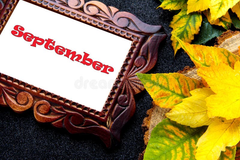 Wooden Frame with the Inscription September on a Black Background Stock ...