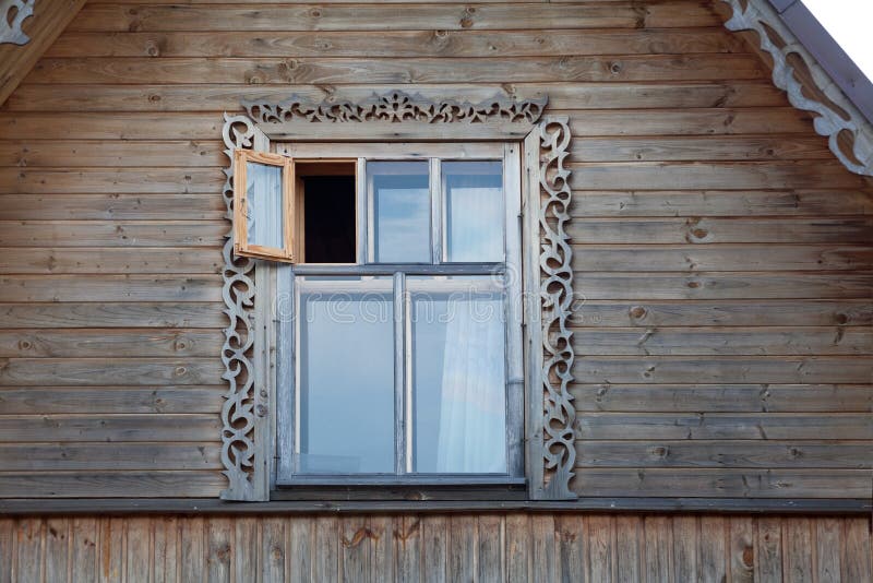 Wooden Frame Window with Small Leaf in the Roof Ridge Stock Photo ...