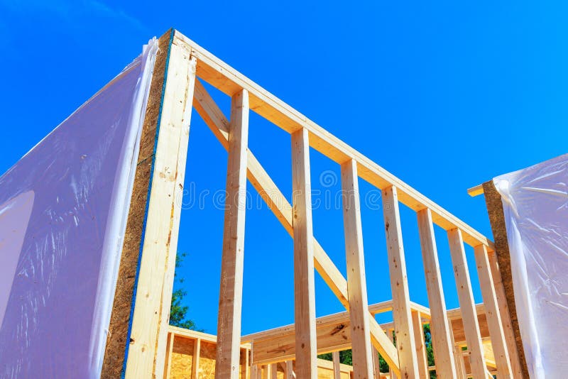New Construction Framework Nearing Completion Under Clear Blue Sky in ...