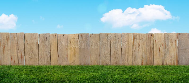 Wooden Garden Fence with Spring Grass at Backyard Stock Image - Image ...