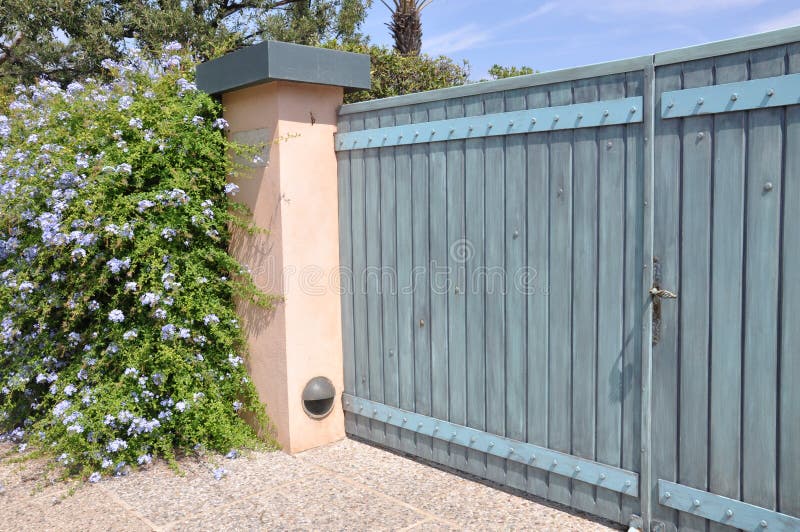 Wooden Gate with a Big Green Bush Stock Image - Image of europe, green ...