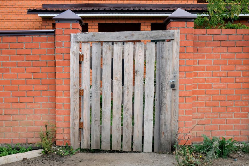 Wooden Gate in a Brick Wall. Castle Entrance Stock Image - Image of ...