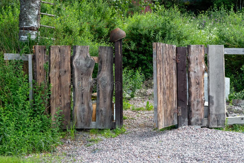 Wooden gate in the forest stock image. Image of fencing - 231946273