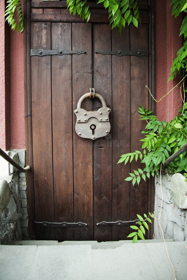 Wooden Gate with Large Hinged Iron Lock in the Village . Rustic Style ...